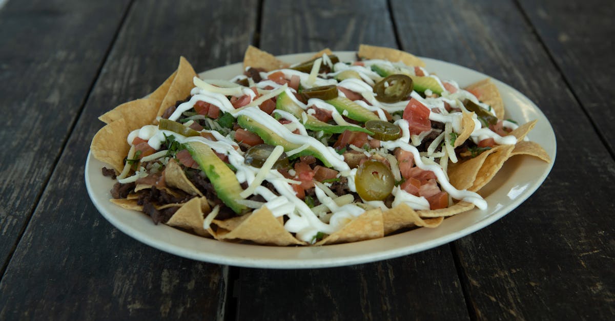 Ultimate Nacho Recipe: Crispy Layered Nachos With Homemade Cheese Sauce